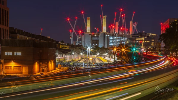 Cityscape at Night with Light Trails and Industrial Cranes | city photo ...