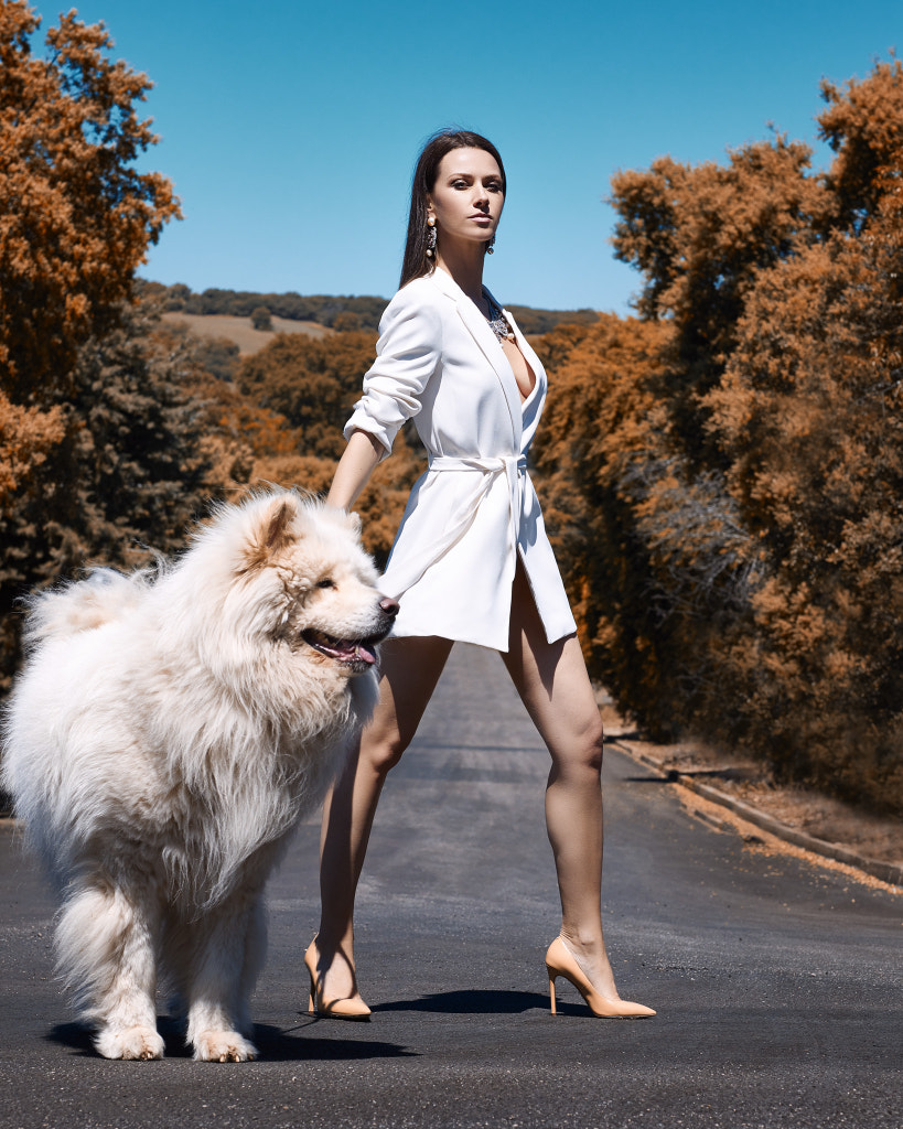 Olga walking Akita by Javier Ullastres / 500px