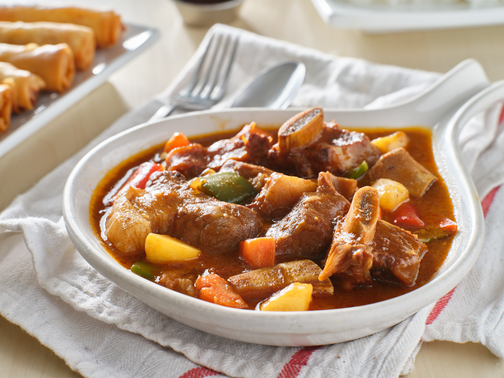 filipino beef kaldereta in bowl by Joshua Resnick / 500px