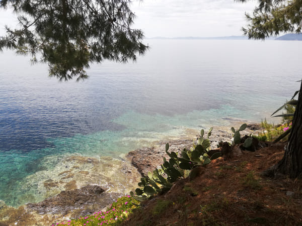 sea view near the cliffs with cristal clear waters in greece by teo ...