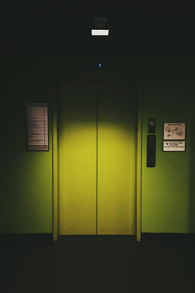 Green elevator illuminated at night by Alex Uhlarik | 500px