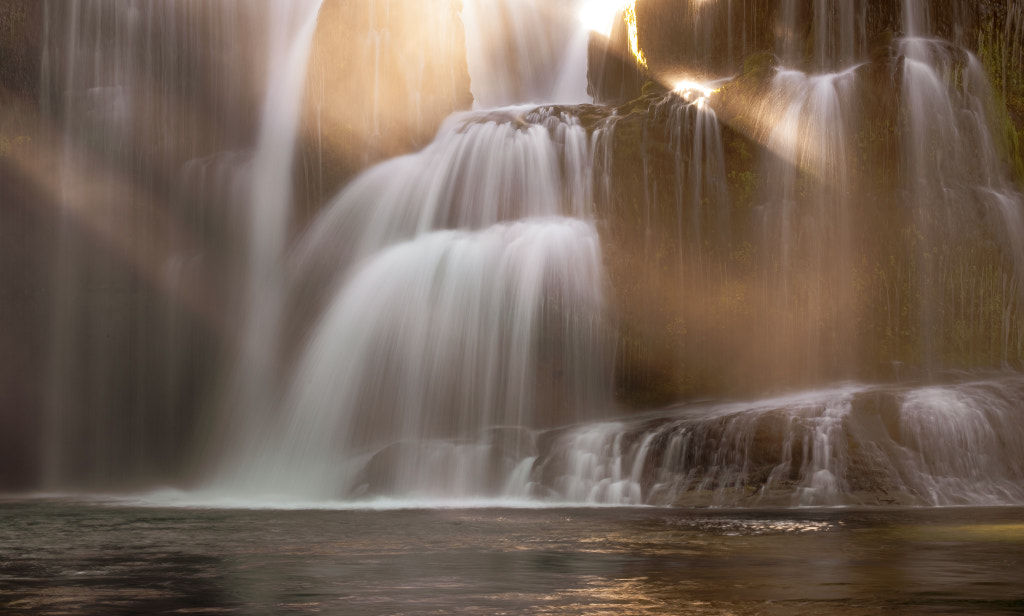 Waterfall light and mist by Rick Huff / 500px