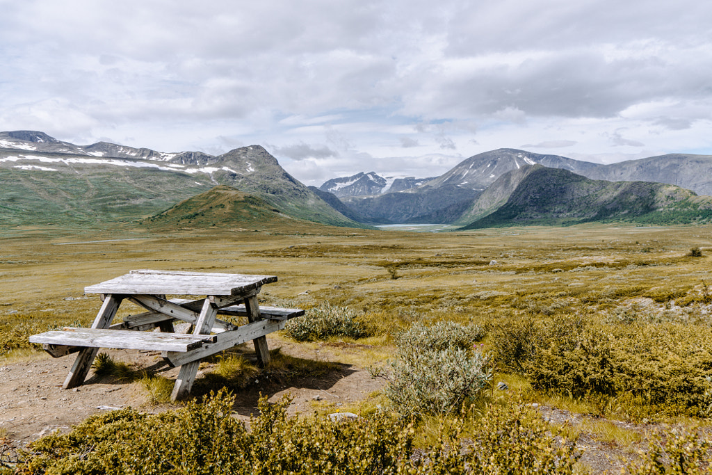 Wooden bench along the road in Jotunheimen national park in Norway by eswaran arulkumar / 500px