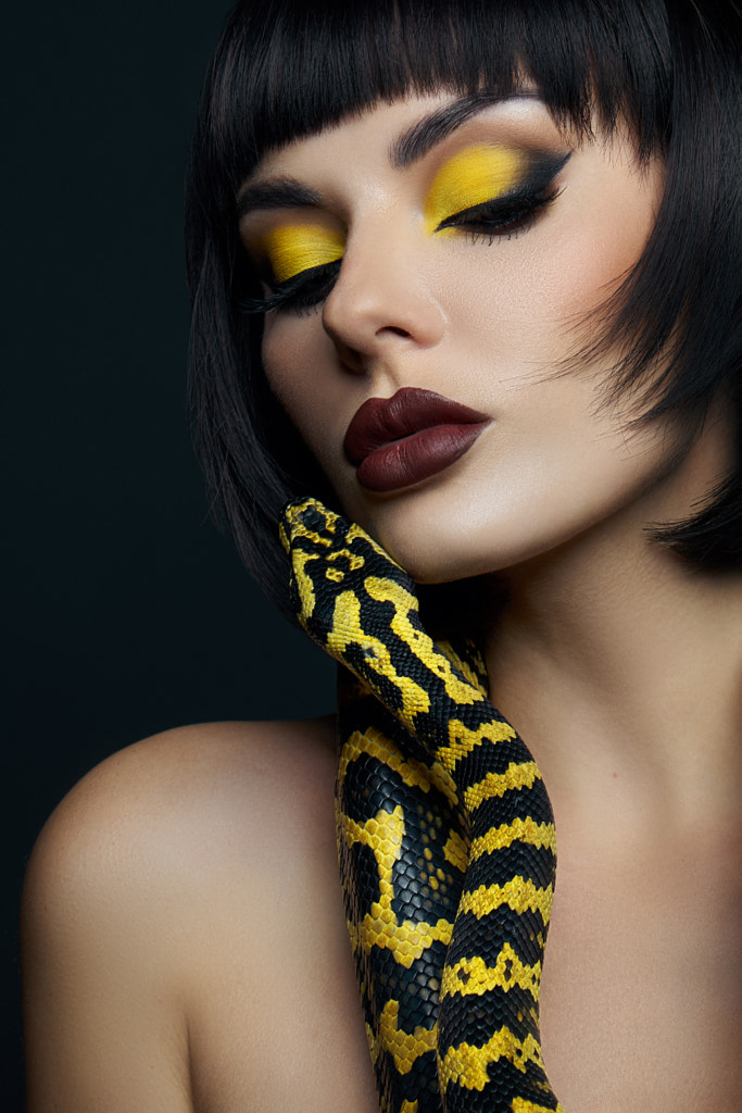 Beauty woman short haircut python yellow snake on her neck by Anna ...