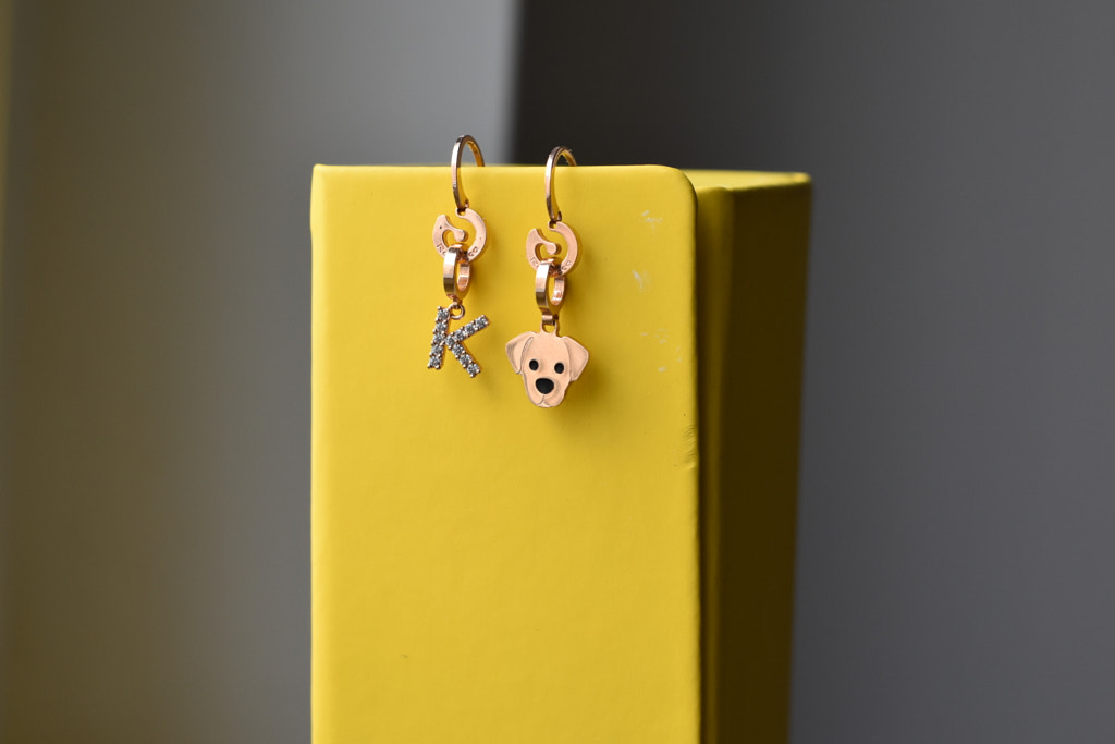 Earing on yellow and gray background by Hristina Nastevska / 500px