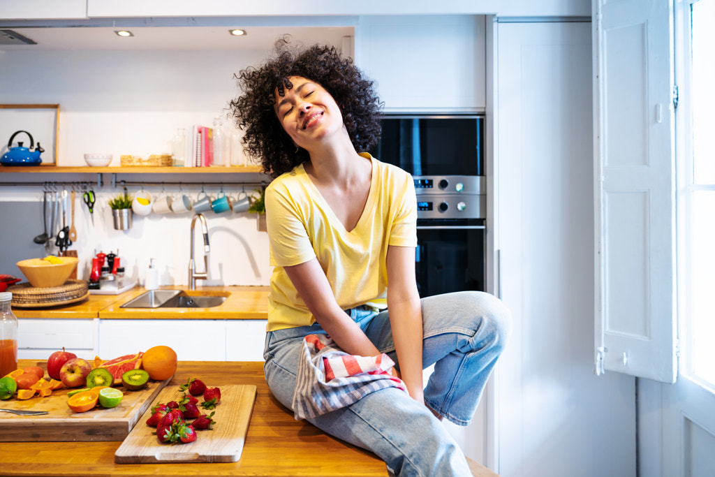 Beautiful latino woman at home by Fabio Formaggio / 500px