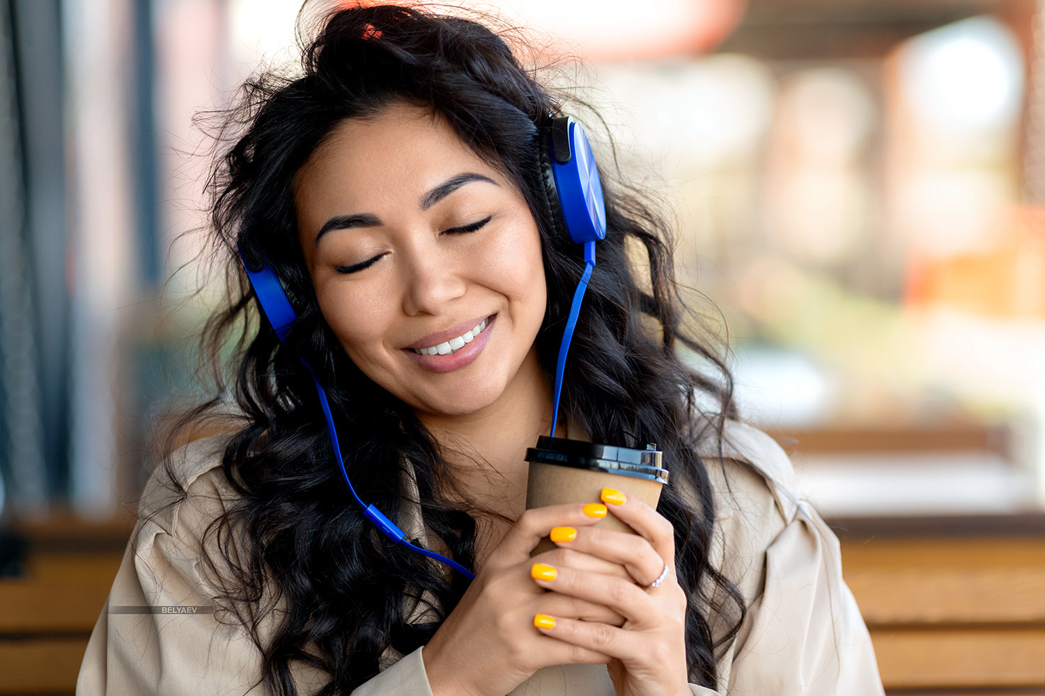 Smiling Woman Enjoying Music with Headphones and Coffee | people photo ...