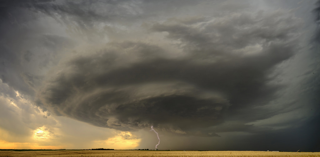 Sunset Supercell Drops Lightning Bolt by Fred Walder / 500px