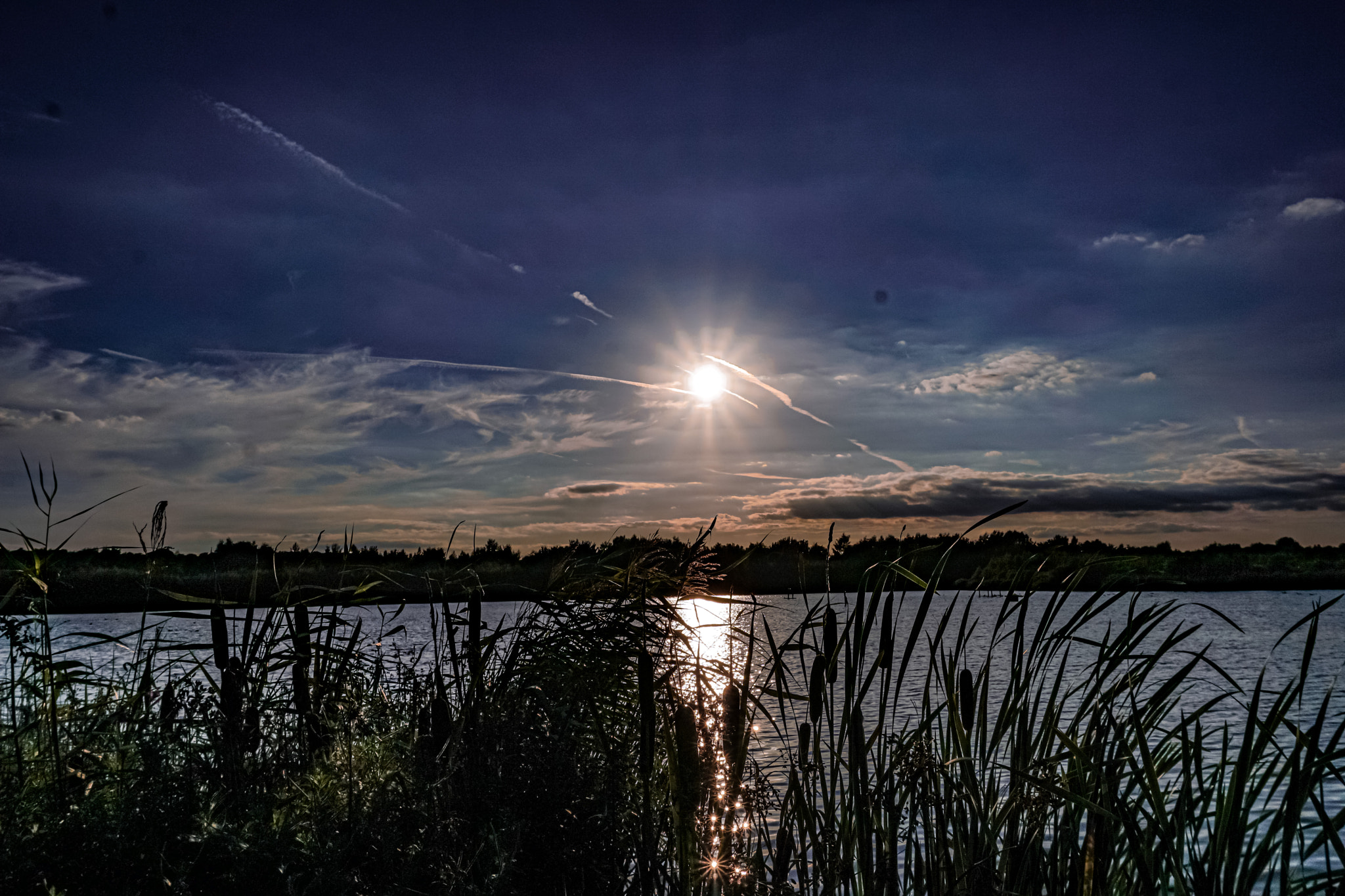 Sunset Over Lake with Reeds and Reflections | landscape photo by Seema ...