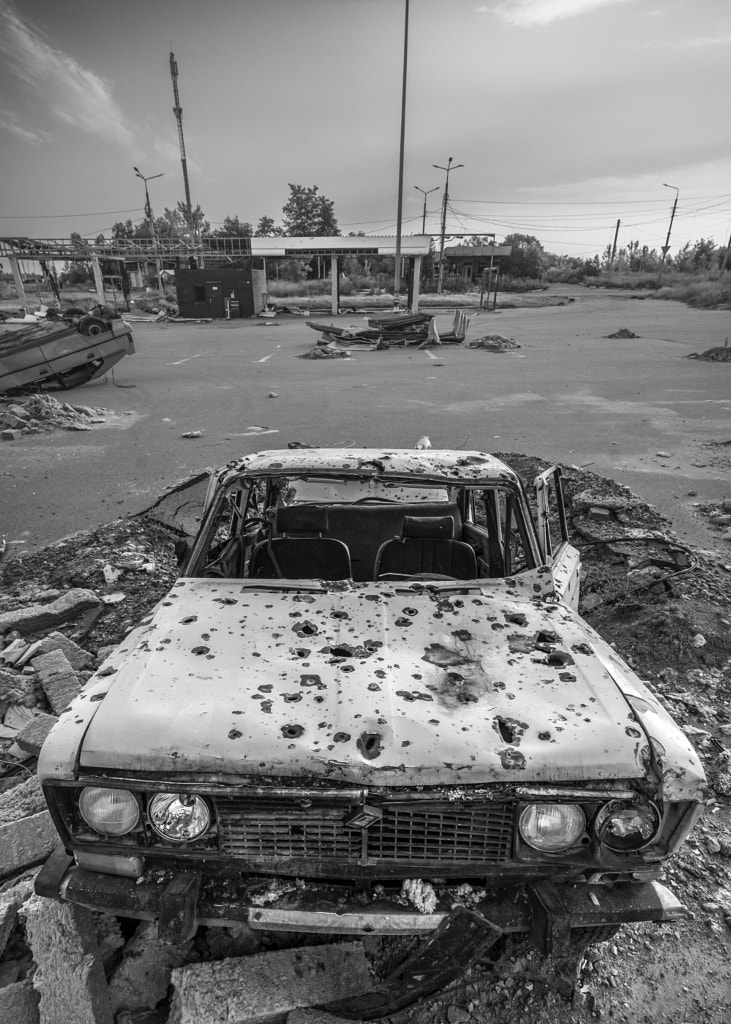 Car in a Crater by claudio de sat / 500px