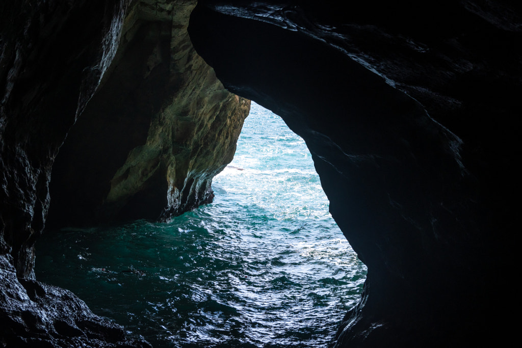 Scenic view of sea seen through cave by Seif Ibrahim / 500px