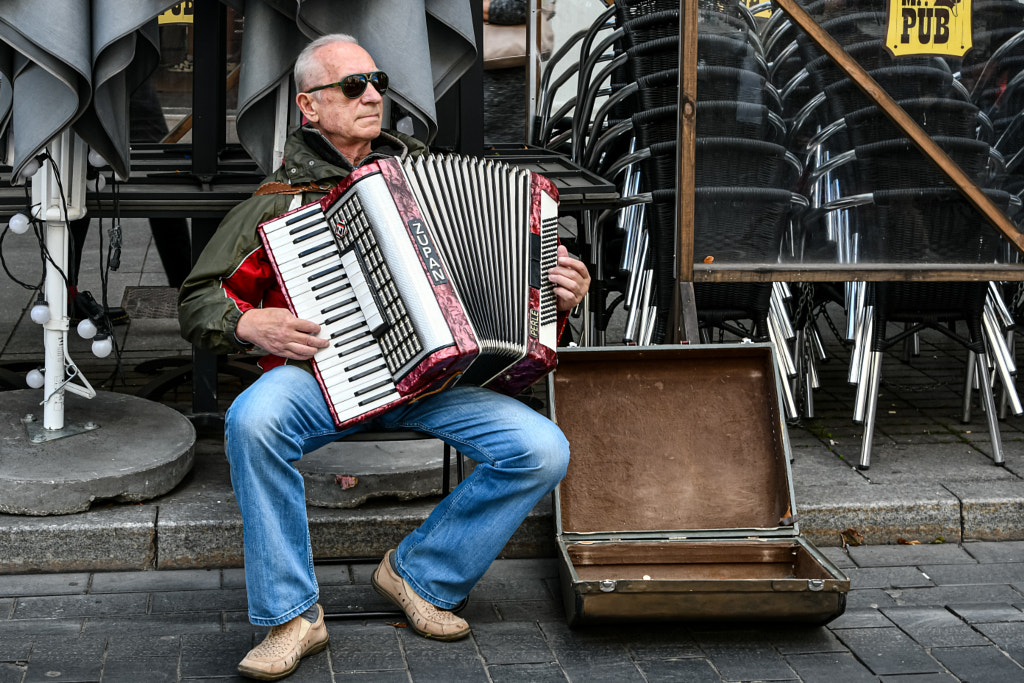 Man playing accordion on the street by Владимир Грошев / 500px