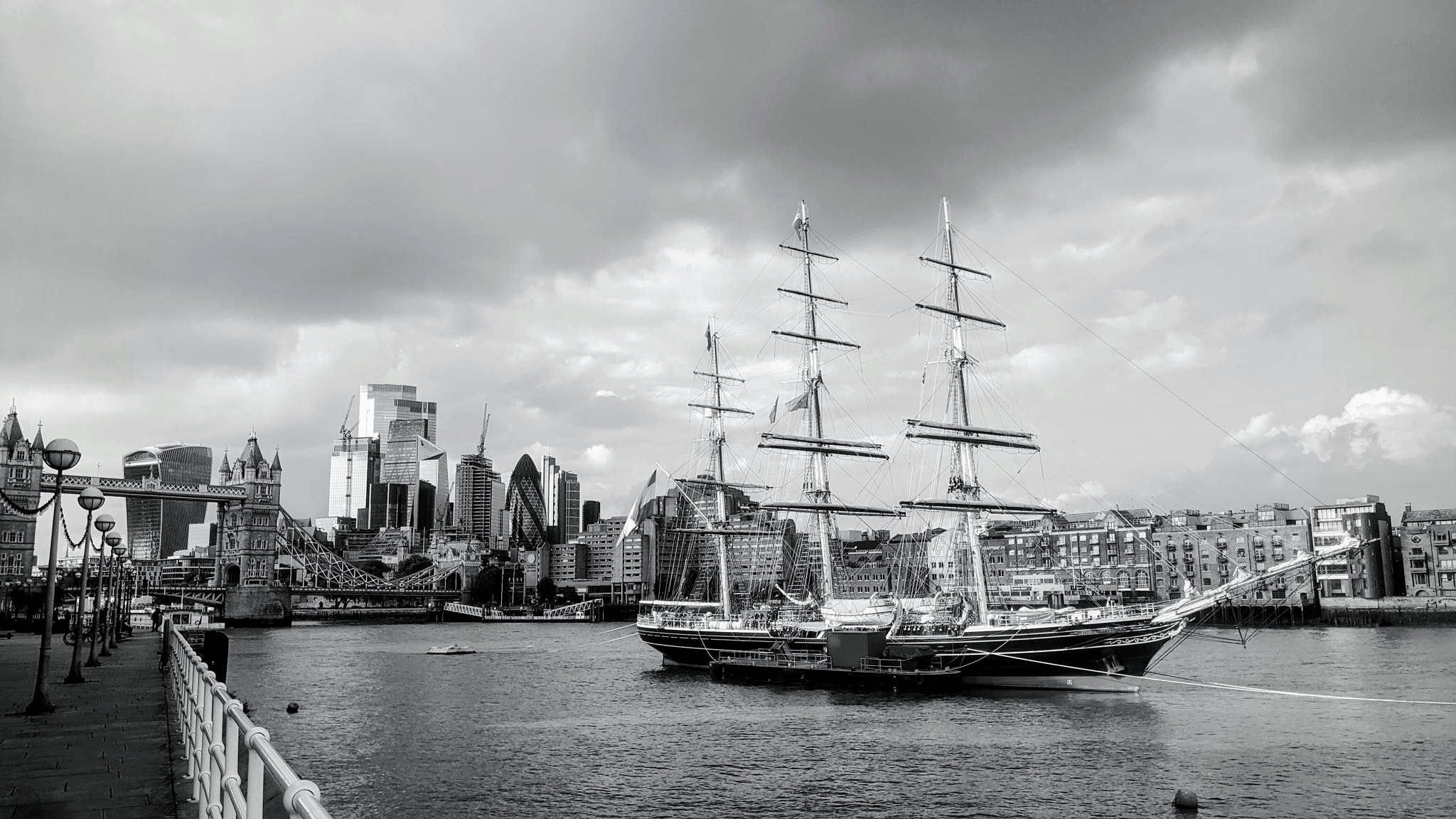 Old ship docked by Tower Bridge in London by Sergei Golubev / 500px