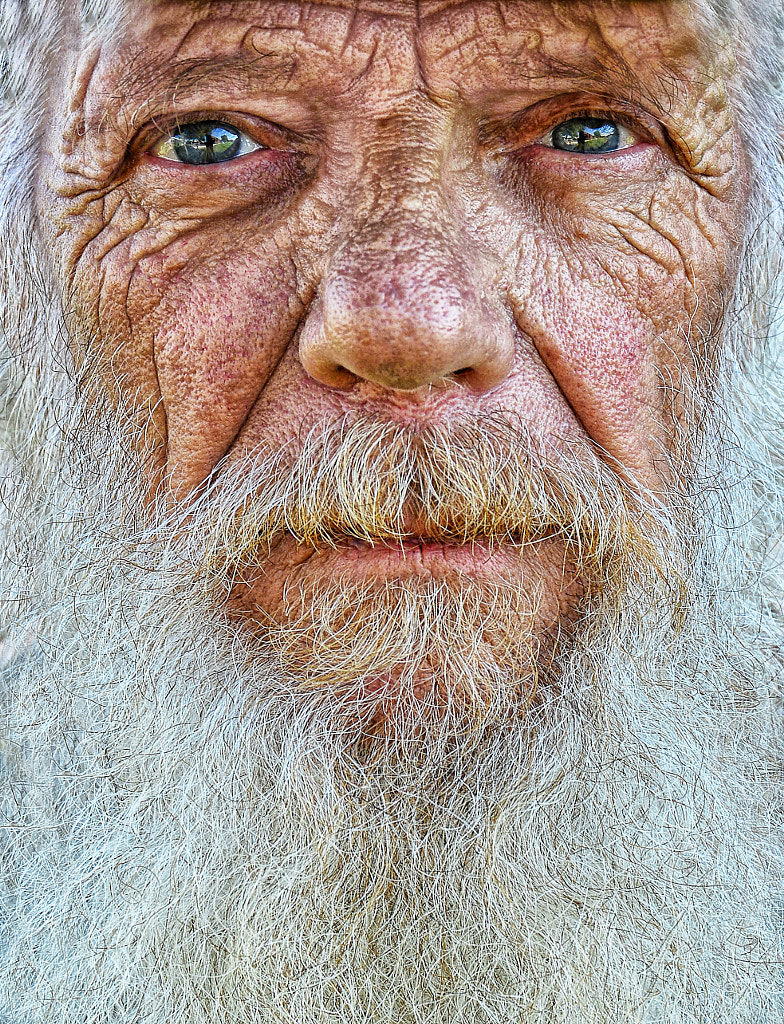 Close-up portrait of bearded man by Gary Koenig / 500px