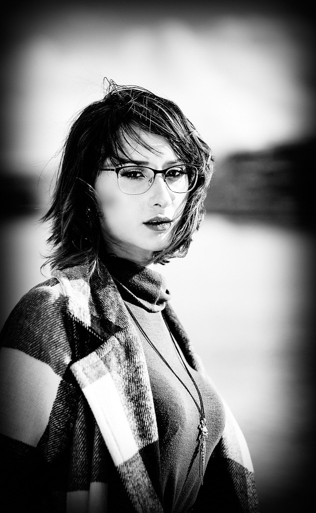 Portrait of young woman wearing eyeglasses by Rafael Portraits - un ...