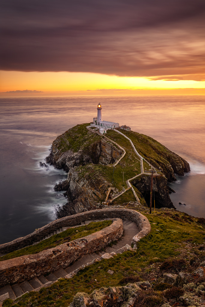 Sunset at South Stack Lighthouse by Peter Krocka / 500px