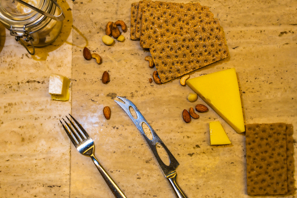 flat lay photography of cheese display on a board by Erik Ding / 500px