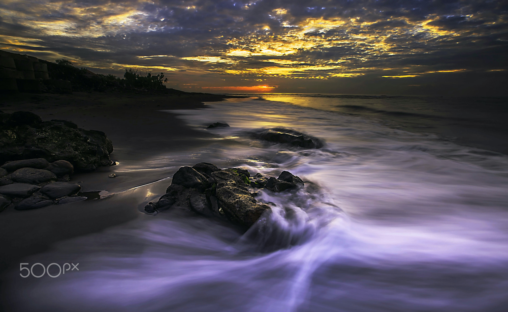 Golden Sunset Over a Rocky Beach Shoreline | landscape photo by Bertoni ...