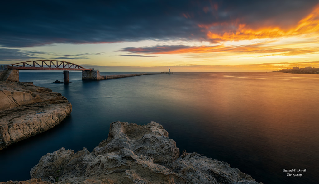 Breakwater-sunrise by Richard Brockwell / 500px