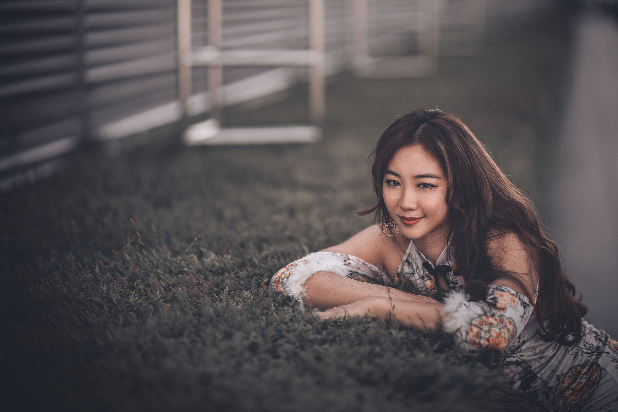 Ziyi Kuek~Portrait of woman lying on field by Steven Chiow / 500px