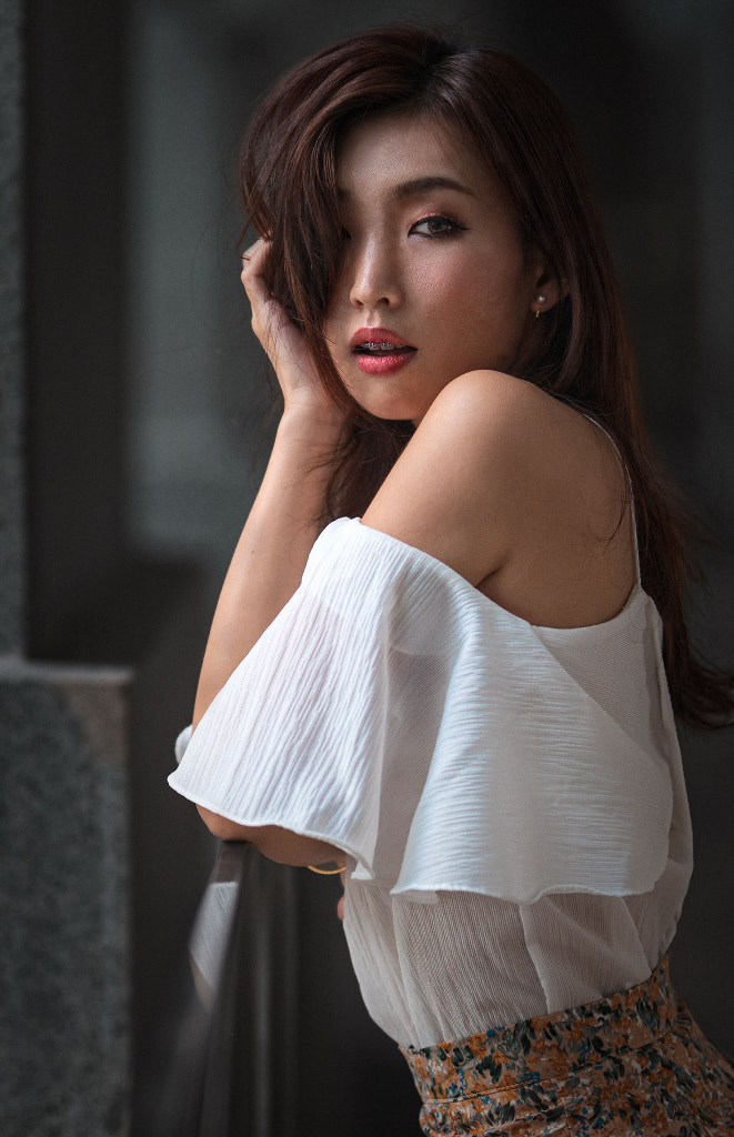 Kiki Sun~Portrait of young woman standing at home by Steven Chiow / 500px