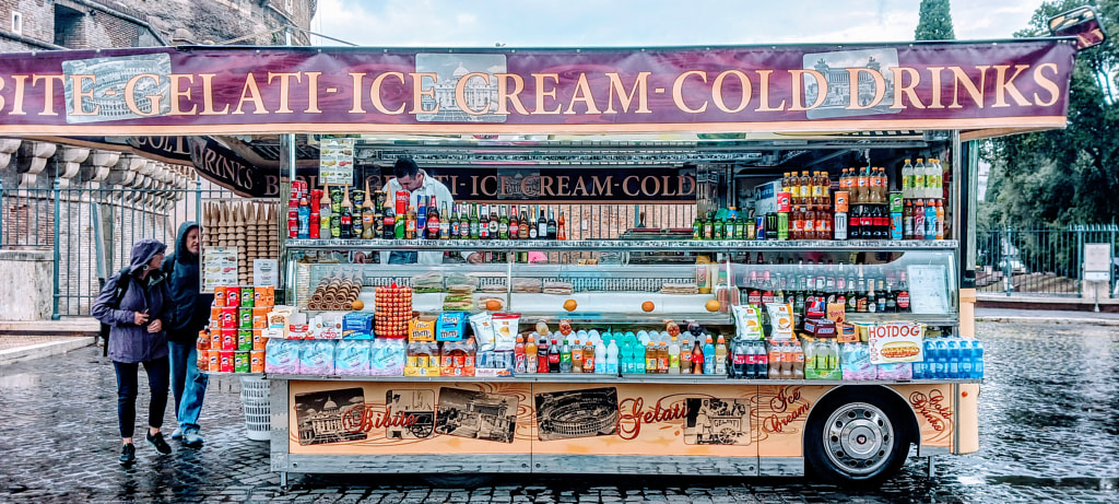 Group of Woman buying colorful candies at market stall in Rome Italy by ...