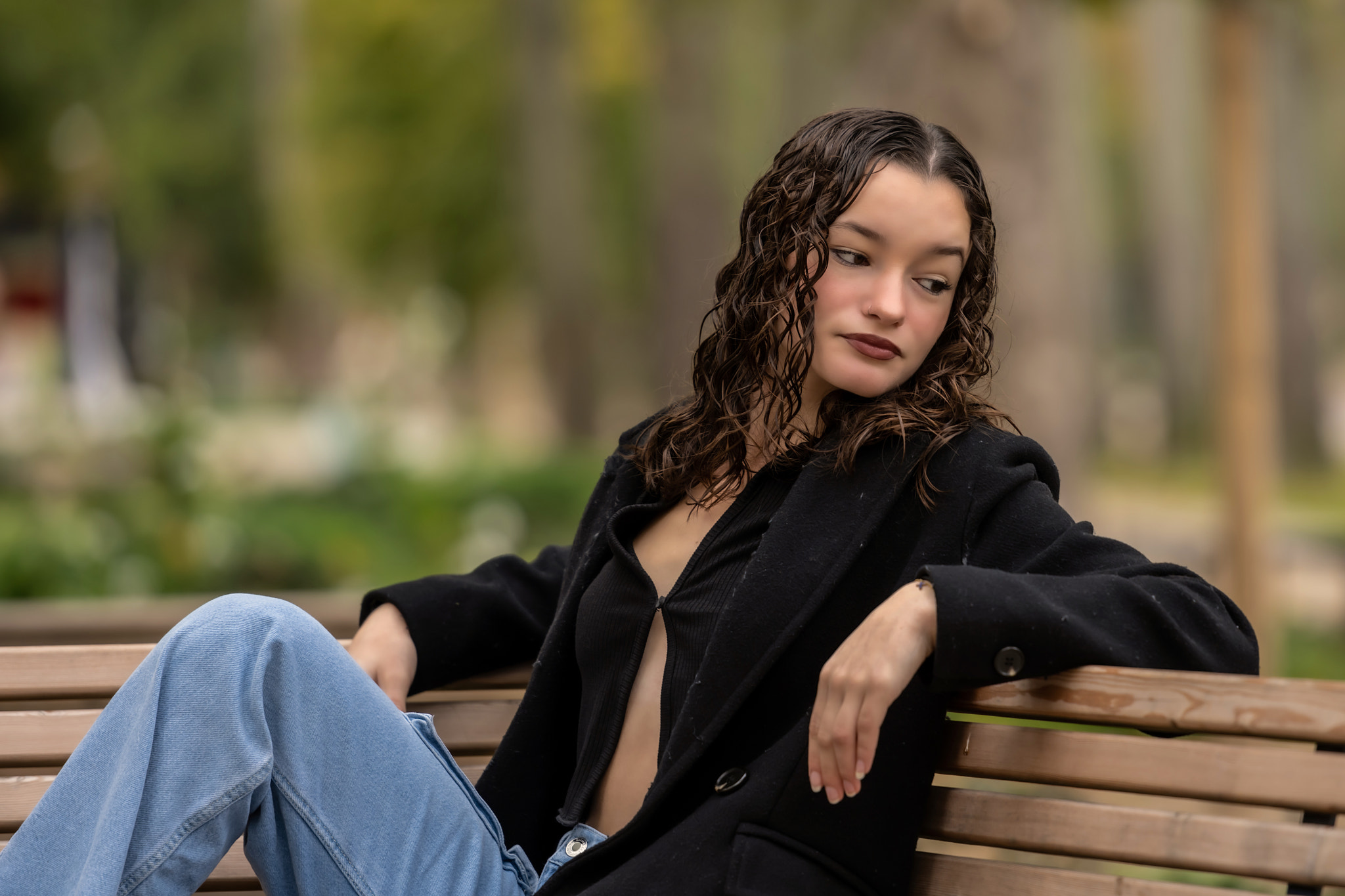 Portrait of girl sitting on bench by Denis Bristiel / 500px