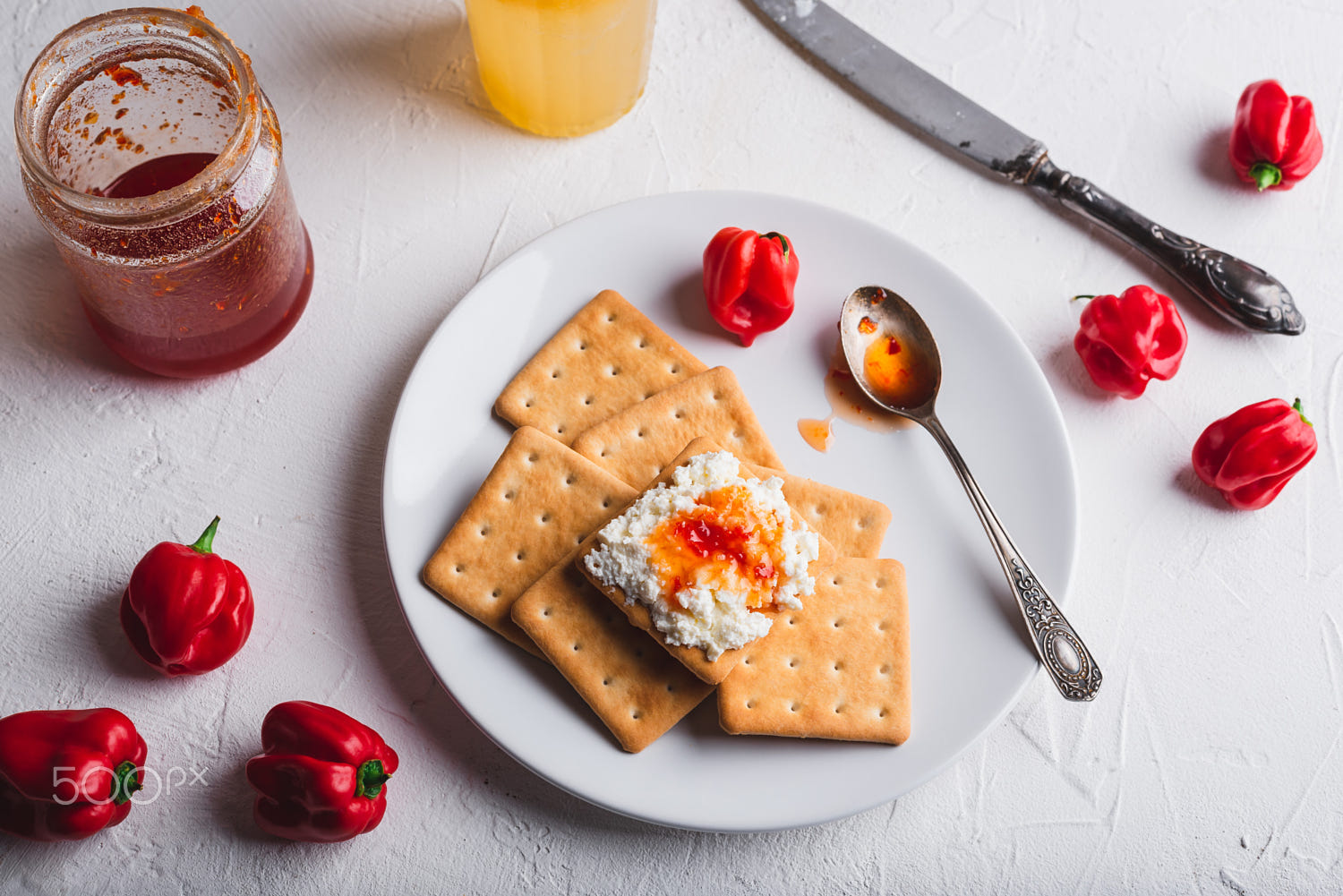 Crackers with Cream Cheese and Hot Pepper Jam by Vsevolod Belousov / 500px