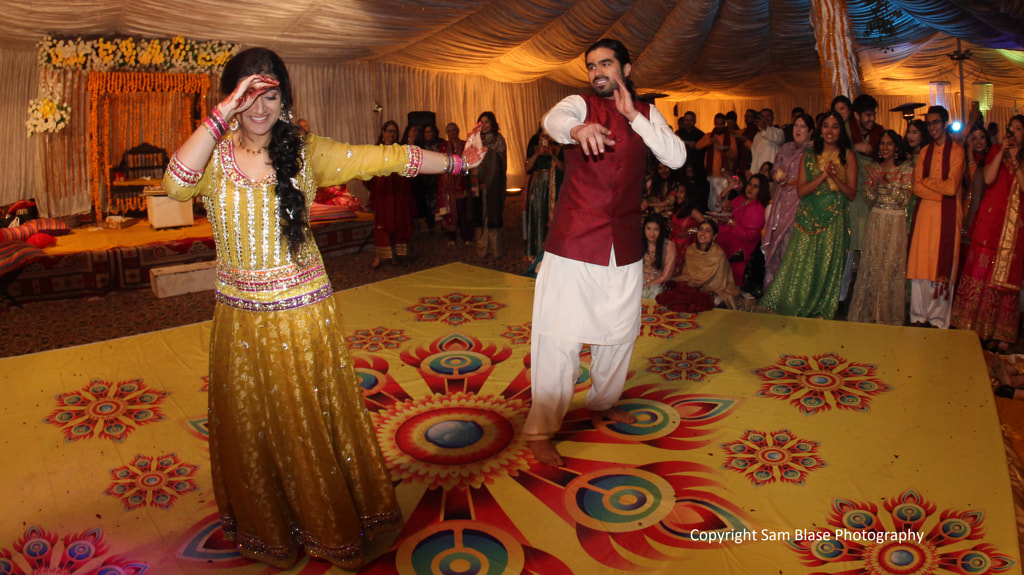View of couple dancing in Pakistan in late December 2019 by Sam Blase ...