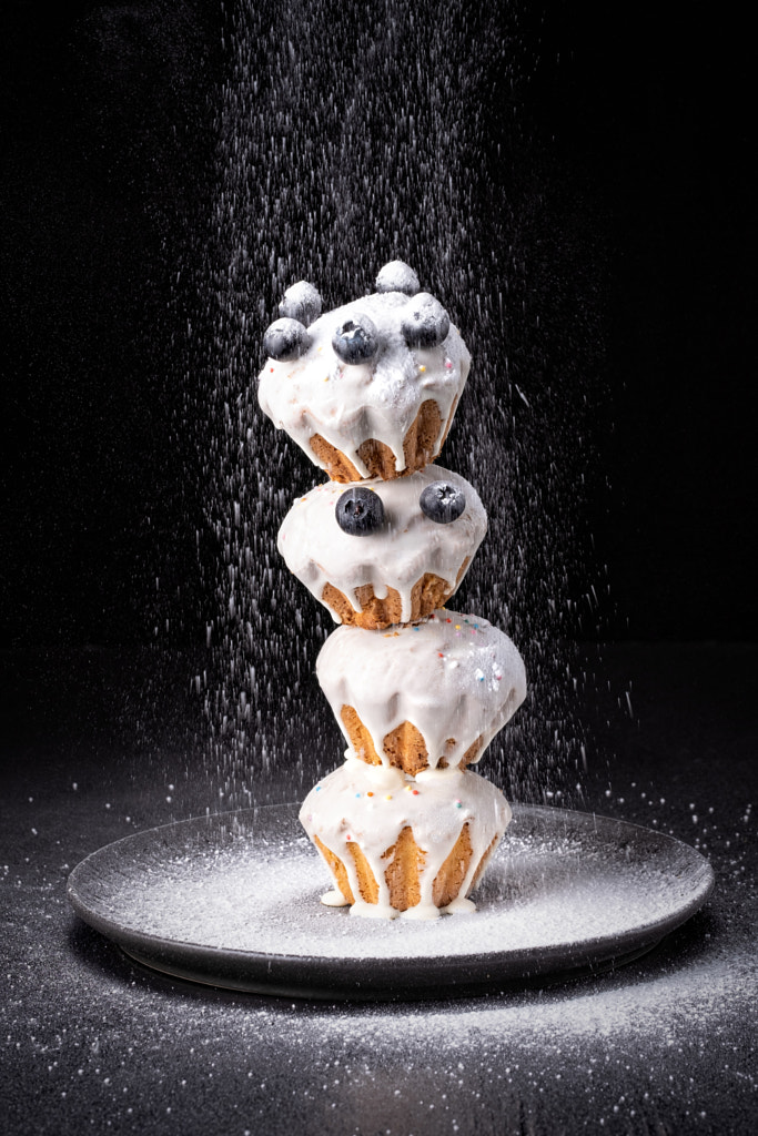 Stack of muffins close-up, black background. Homemade sweet pastries ...