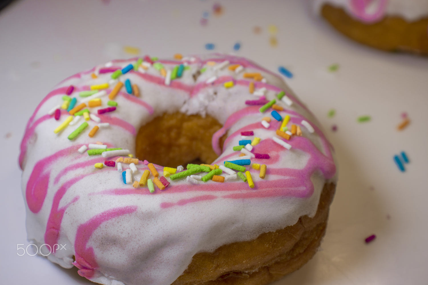 Close-up of donut in plate by Maryam Afshar / 500px