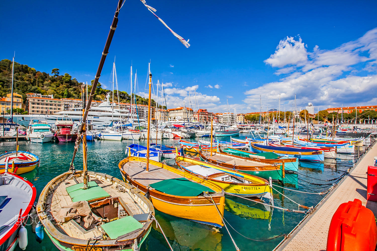 Colorful boats moored at Nice harbor in France. by Armando Mendoza / 500px