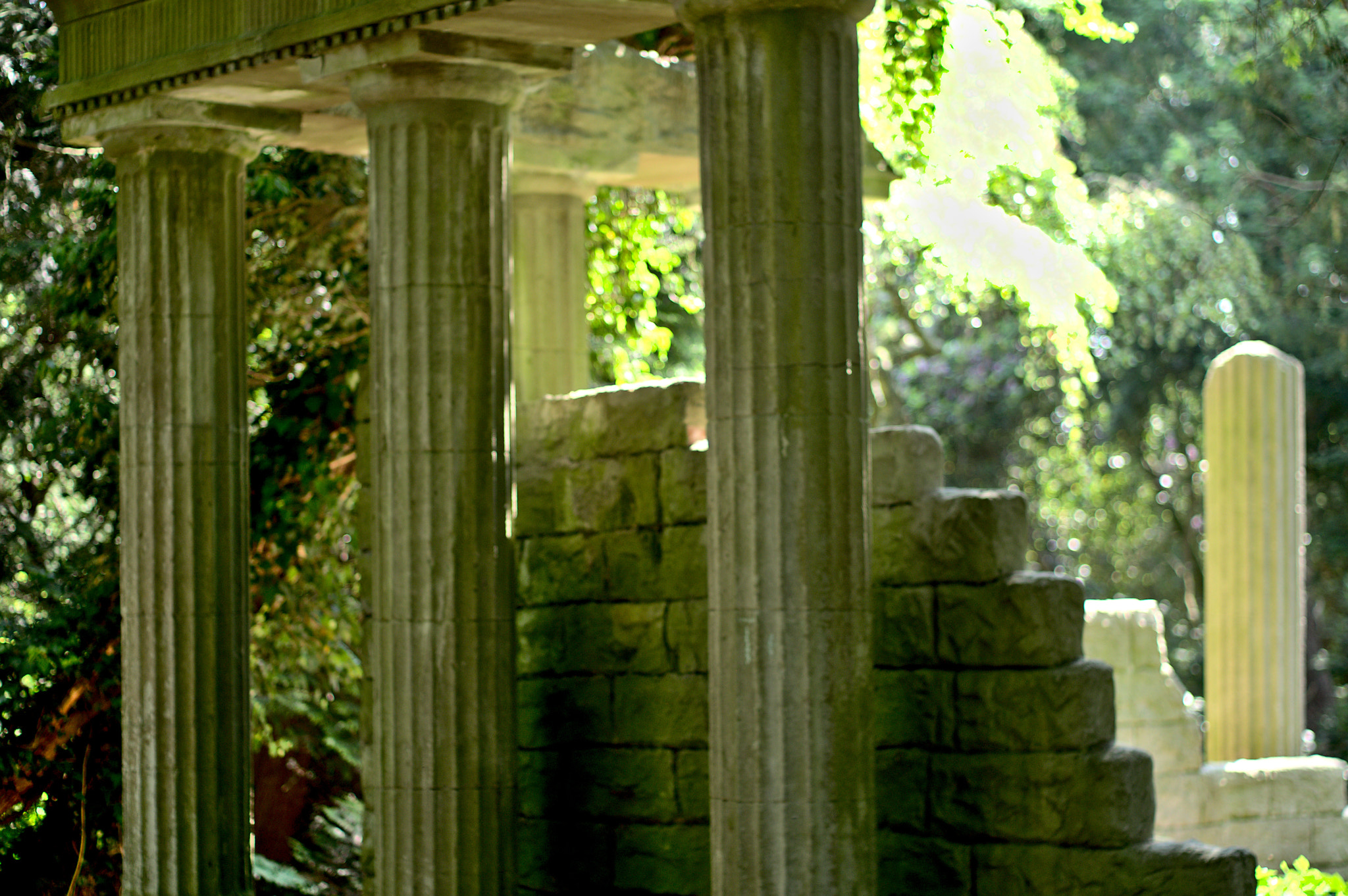 Ancient Stone Columns in Lush Green Setting | city photo by Onkel ...