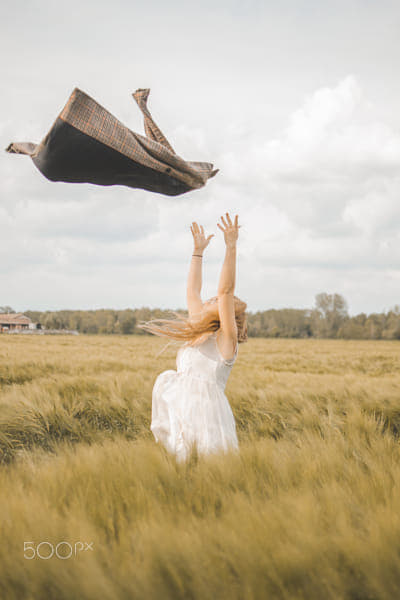 Woman Throwing Jacket in Golden Field | people photo by Carlotta ...