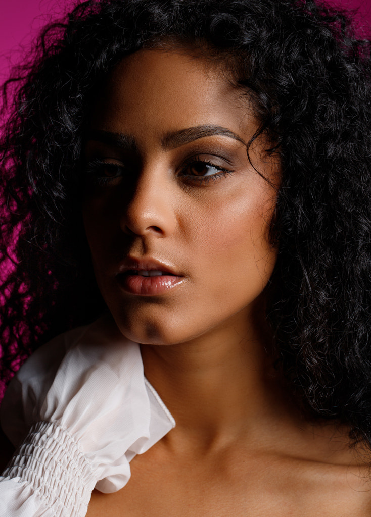 Beautiful Woman with Curly Hair and Vibrant Background | people photo ...
