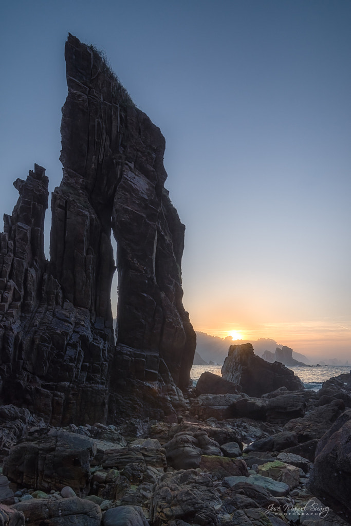 Dramatic Sea Stack at Sunrise on Rocky Coast | landscape photo by José ...