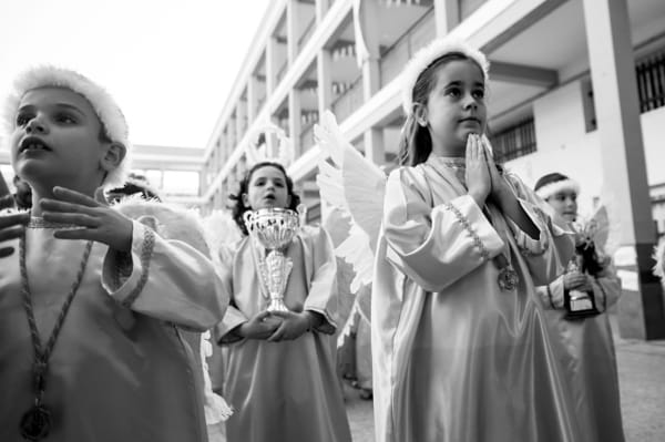 Aerial view of people surfing in sea by Ricky Rueda / 500px