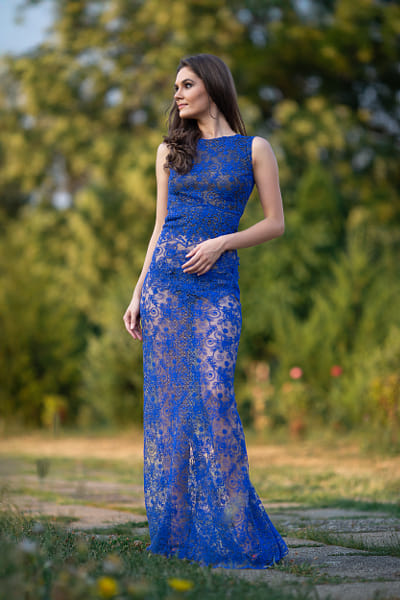 Elegant Woman in Blue Lace Dress Posing Outdoors | people photo by ...