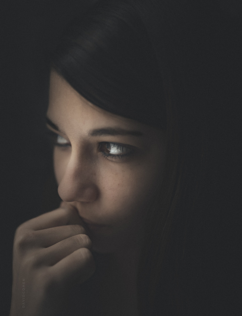 Introspective Portrait of a Young Woman in Low Light | people photo by ...