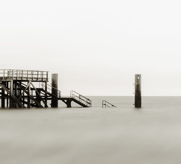 Wooden Pier Steps Submerged in Calm Water | landscape photo by Charles ...