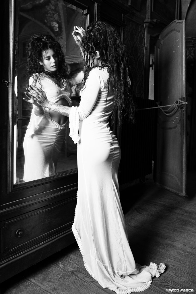 Woman in Elegant Gown Reflected in a Vintage Mirror | people photo by ...