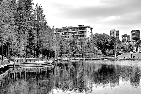 Tranquil Lakeside Cityscape in Monochrome by A. Yukming Yuen | 500px