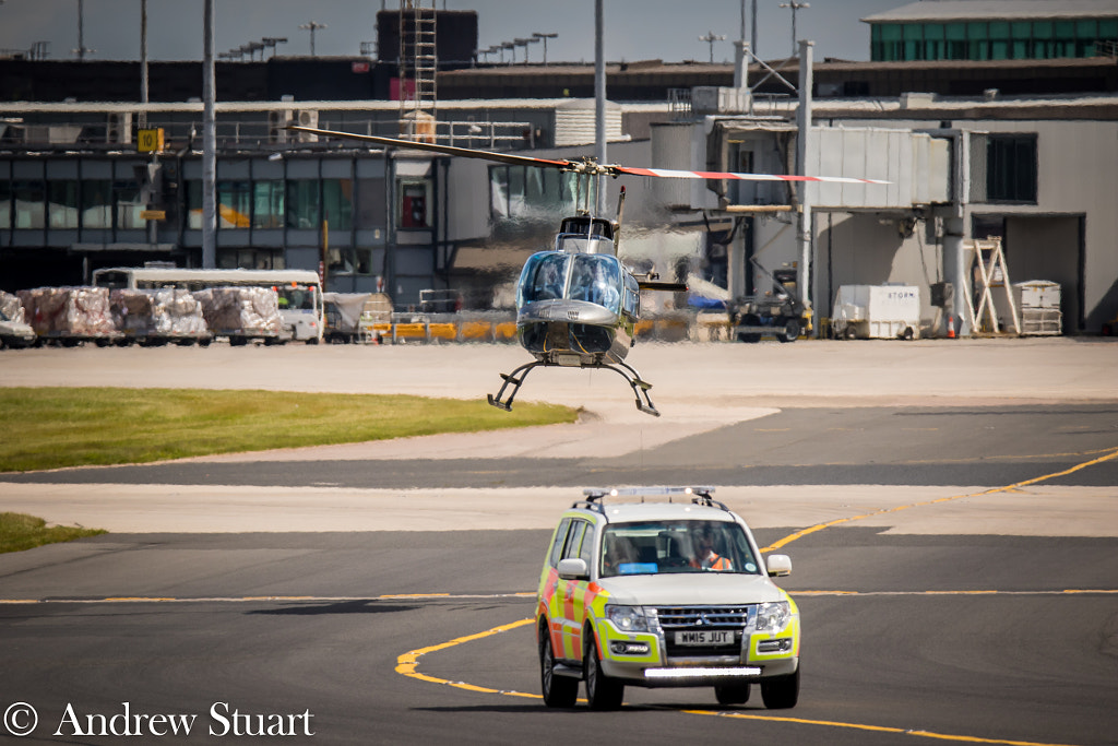 Helicopter surprising an Airport Ops 4x4 driver at Manchester Airport ...