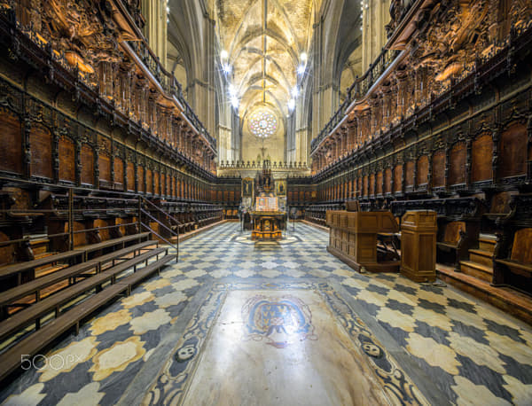 Inside Seville Cathedral showcasing Gothic and Baroque architecture by ...