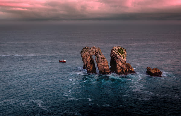 Rugged Sea Stacks Endure Ocean's Power Evoking Timeless Strength | landscape photo by Juan ...
