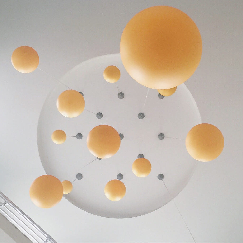 Woman Sitting by Hay Bale in Field | people photo by avner levy | 500px