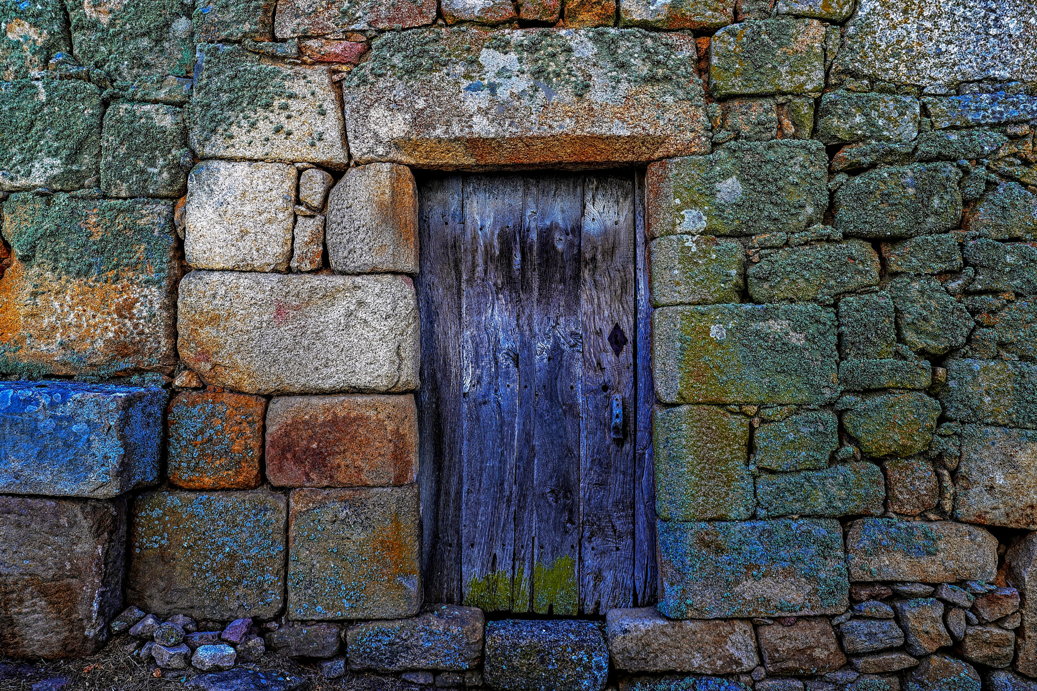 Ancient Stone Wall with Weathered Door Evoking Sense of History | city ...