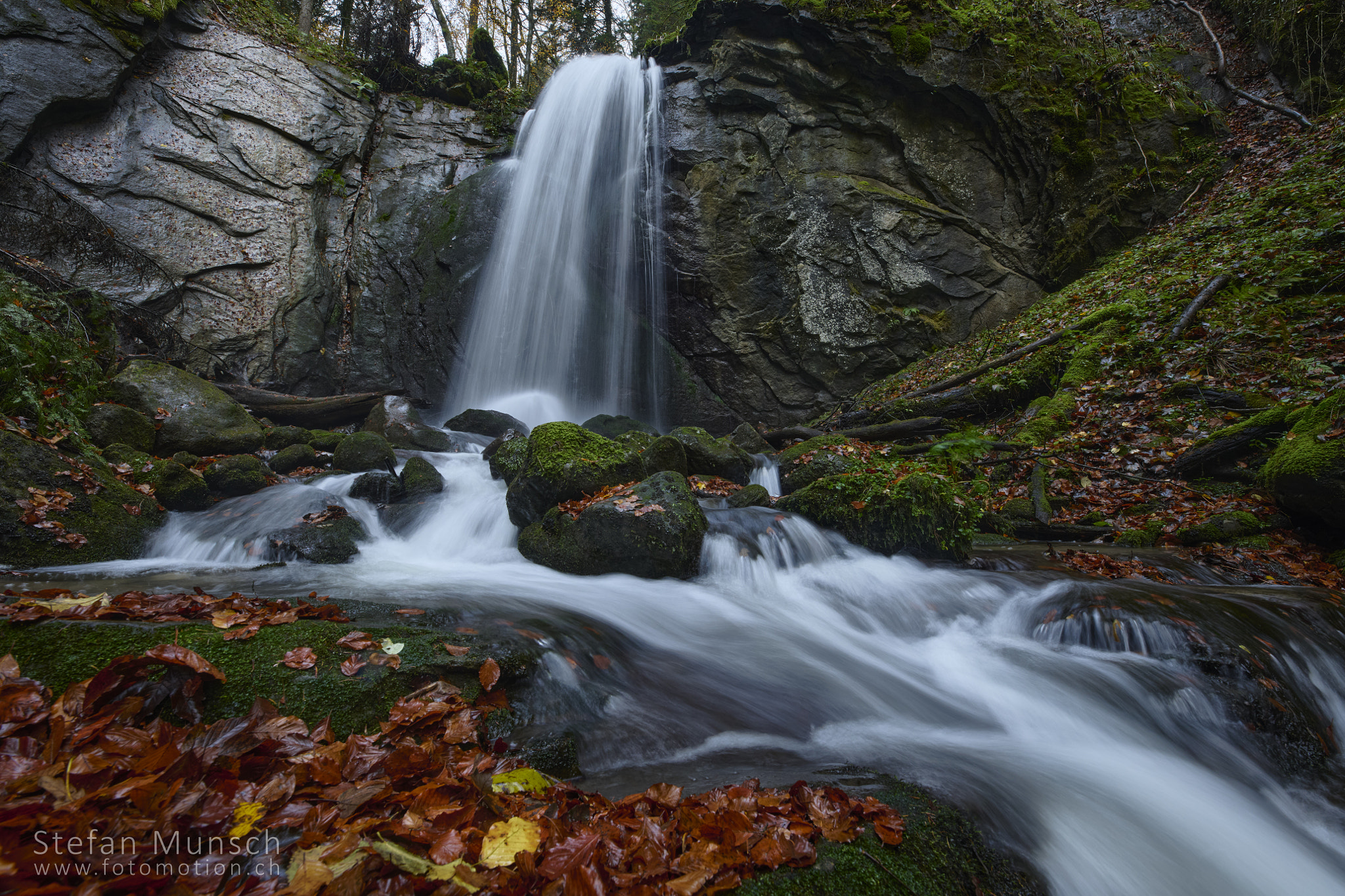 Waterfall Cascading Over Rocks Evoking Serenity and Natural Beauty ...
