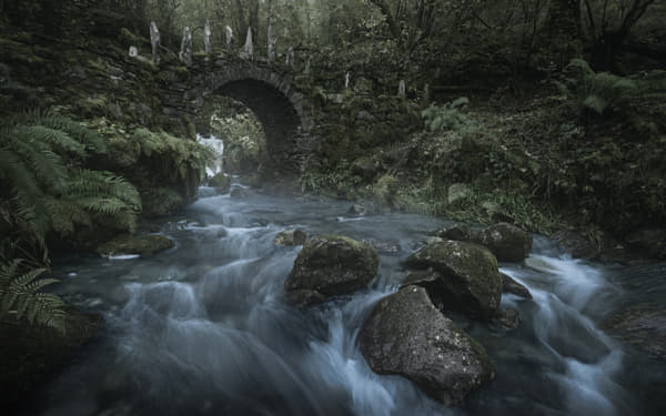 Ancient Stone Bridge Over Rushing Stream Suggests Timelessness and ...