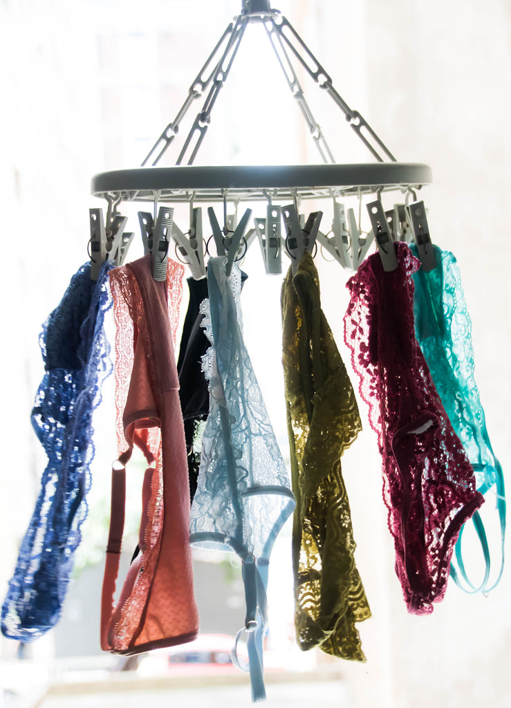 Lingerie Drying Symbolizing Intimacy and Personal Expression | still ...